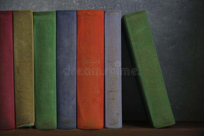 Home Library of Old Battered Retro Books with Colored Spines. Stock ...