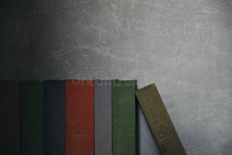 Home Library of Old Battered Retro Books with Colored Spines. Stock ...