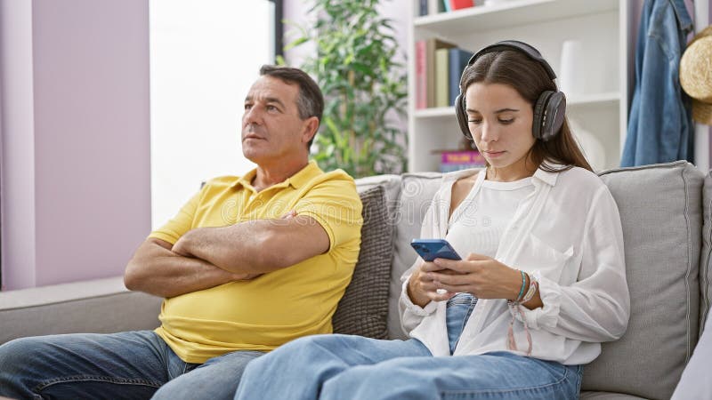 At Home, a Loving Father and His Daughter Relaxing on a Comfortable ...