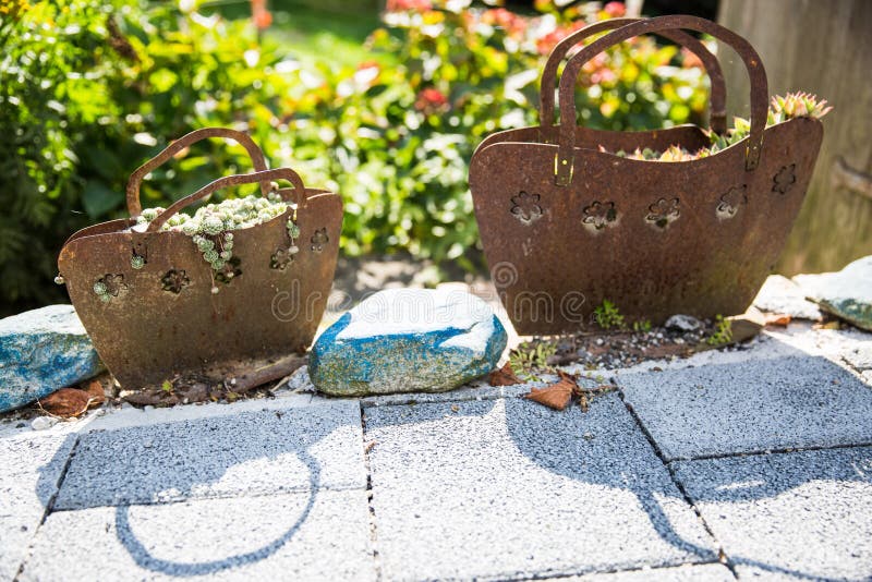 Home Made Cast Iron Flower Pots and Outdoors Decorations Stock Image ...