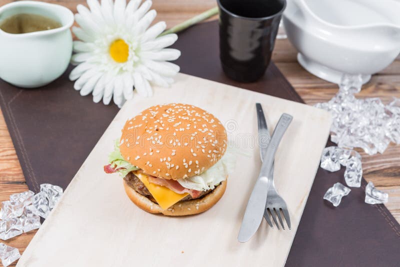 Home made cheeseburger stock photo. Image of table, menu - 95878526