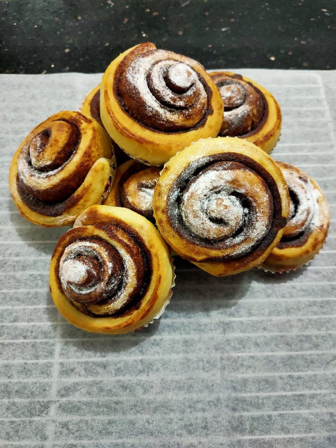 Home Made Cinnamon Rolls with Sugar Powder Dusted Stock Photo - Image ...
