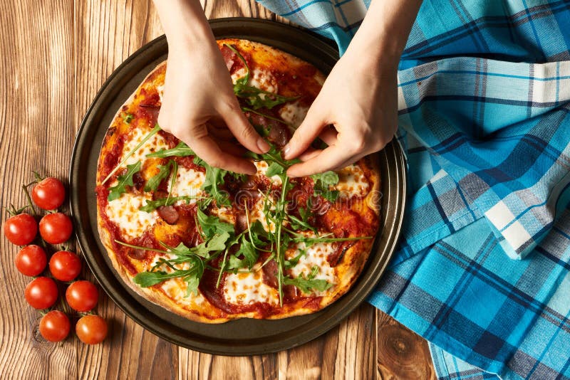 Home Made Pizza on Wooden Table Stock Image - Image of arugula, hands ...