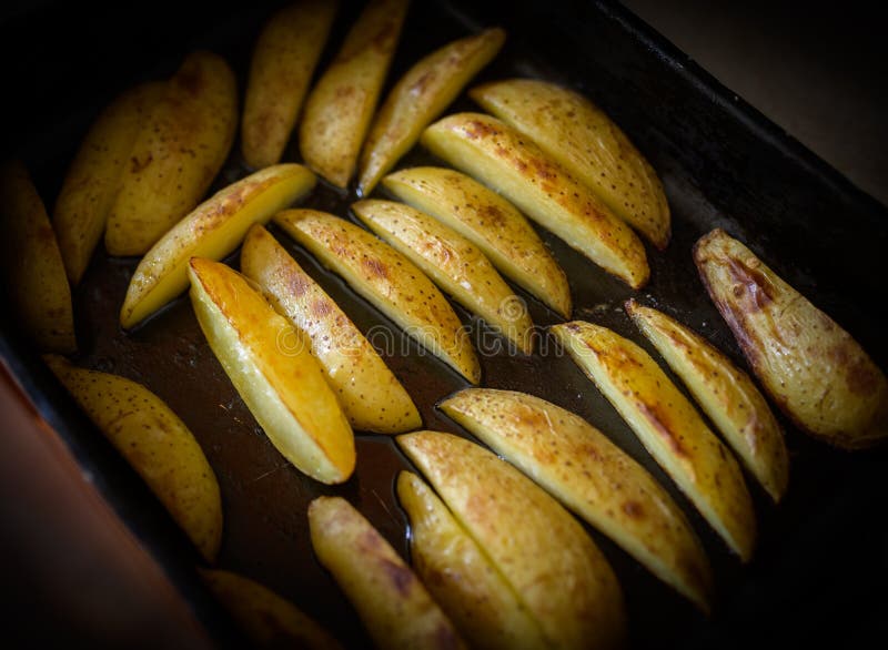 Home made rustic potatoes. stock image. Image of food - 194038601