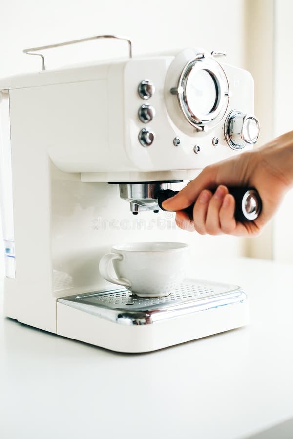 Home Mini Coffee Machine on a White Table Stock Image - Image of ...