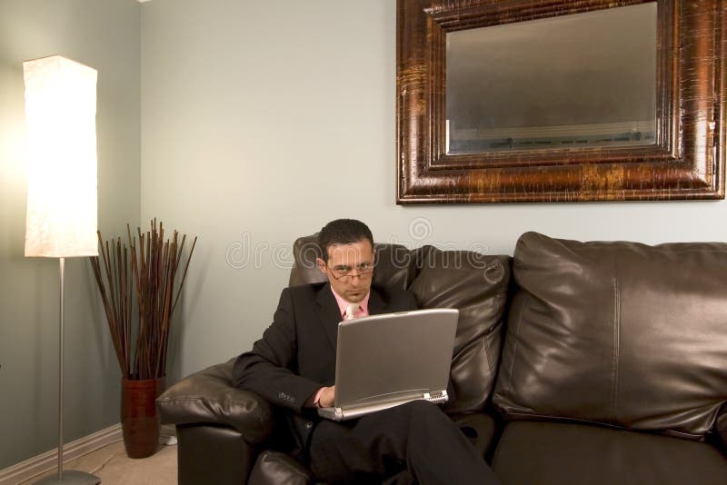Home or Office - Businessman Working on the Couch Stock Photo - Image ...