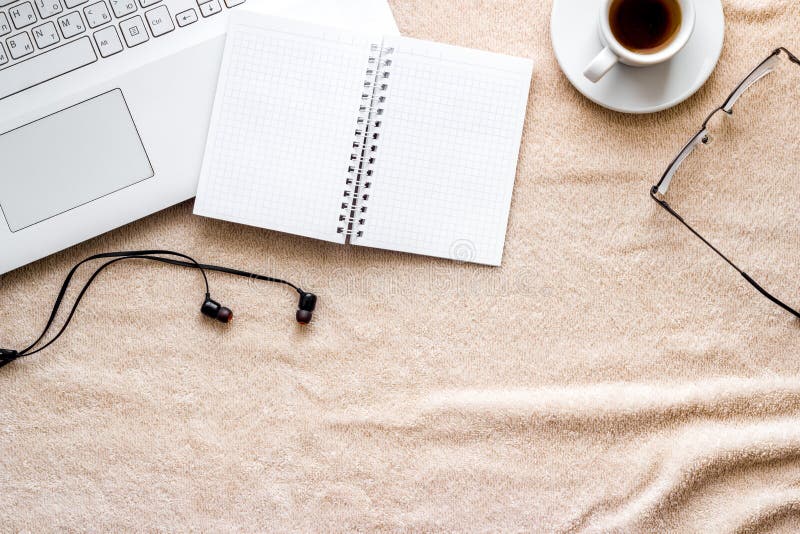Home Office Concept. Laptop, Notebook on Beige Blanket Form Above Copy ...