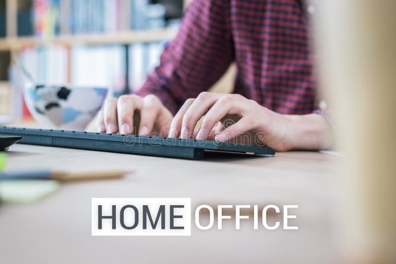 Home Office Concept: Man is Working in Home Office, Tying on Keyboard ...