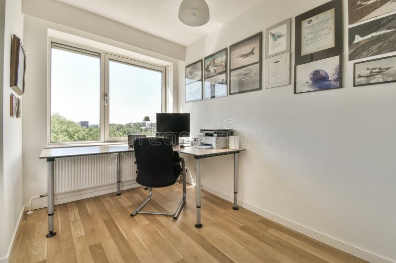 A Home Office with a Desk and a Window Editorial Photography - Image of ...