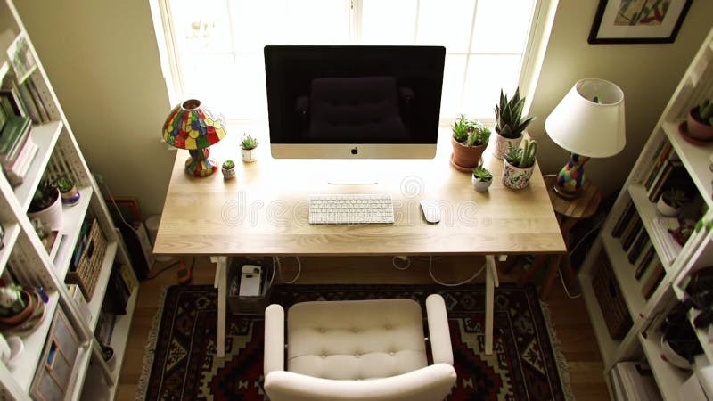 Home Office Setup with a Desktop Computer and Creative Decor Stock ...