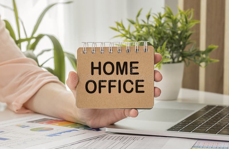 Home Office Text on Sticky Notes in Hand with Office Desk. Stock Photo ...