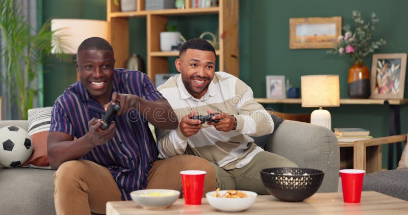 Home, People and Gaming with Controller on Sofa for Multiplayer ...