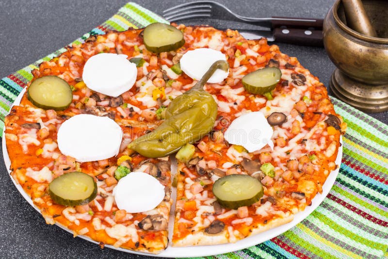 Home Pizza with Mozzarella and Pickled Gherkins Stock Image - Image of ...