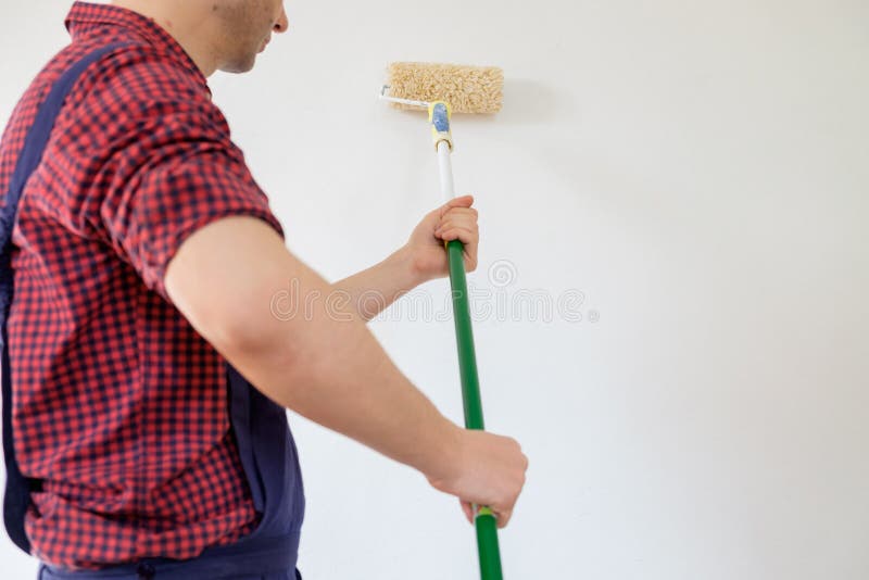 Home Renovation Concept with Man Painting Wall at Home Stock Image ...