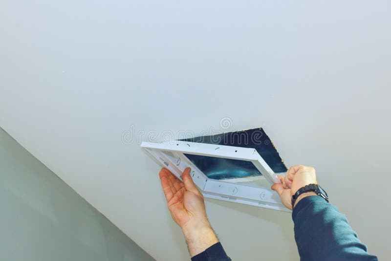 Home Renovation Project Involving Ceiling Access Hatch Installation in ...