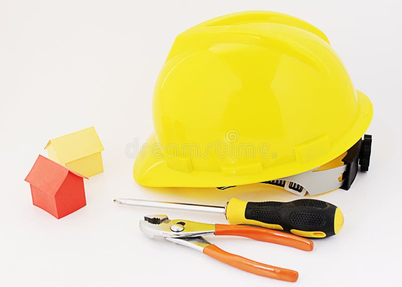 Home Repair Themselves with Helmet and Screwdriver and Pliers Stock ...