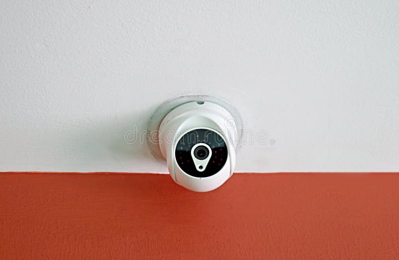 Home Security Camera on Red and White Ceiling Stock Image - Image of ...