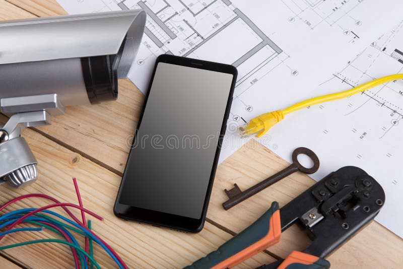 Home Security Concept Smartphone and Surveillance Cctv Camera on the ...