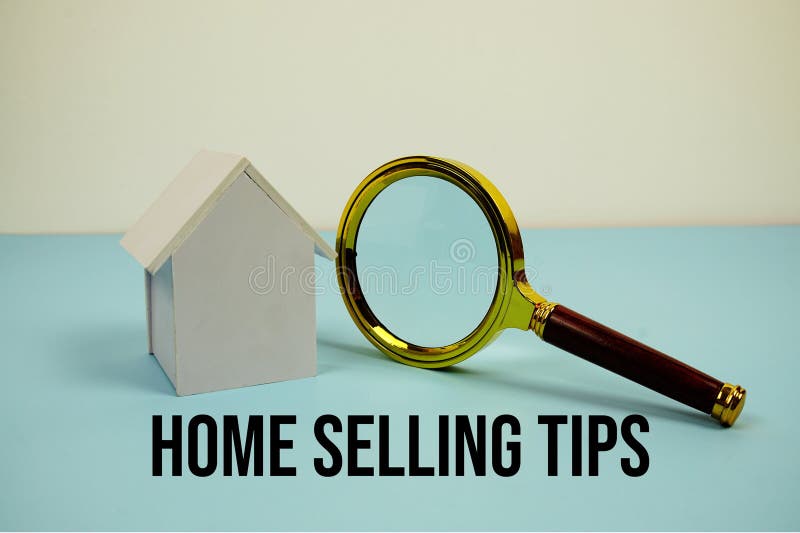 Home Selling Tips Text with White Model House and Magnifying Glass on ...