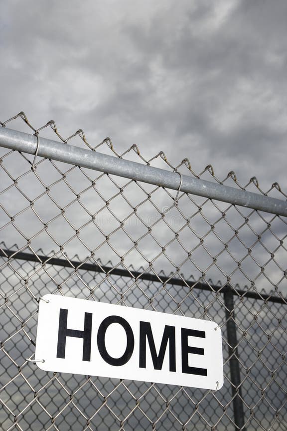 Home sign on metal fence. stock photo. Image of barricade - 2425348