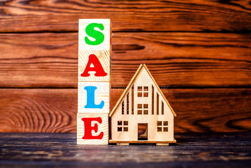 Home and Text on the Cubes Sale Stock Image - Image of home, loan ...