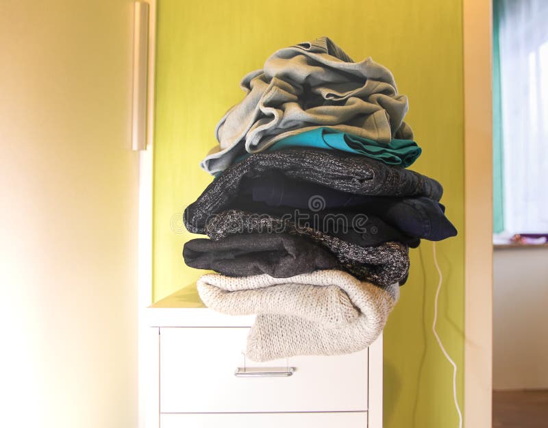 Home Wardrobe with Different Clothes. Vertical Shot. Stock Photo ...