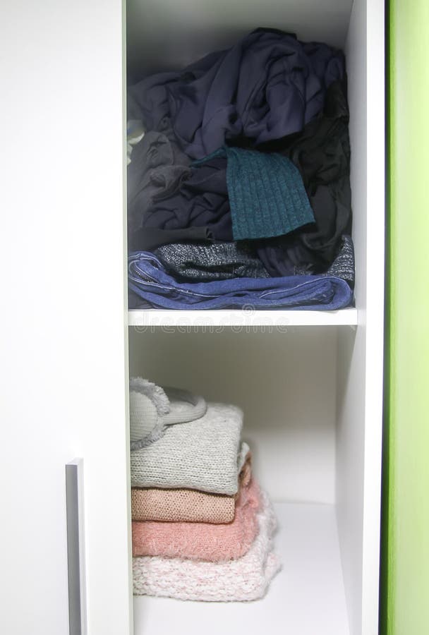 Wardrobe with Different Clothes. Small Space Organization Stock Photo ...