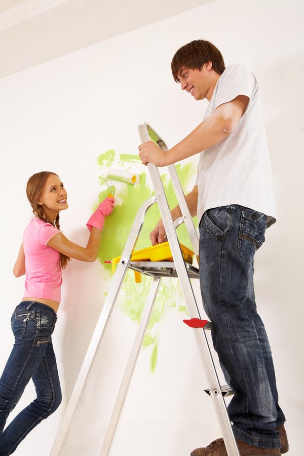Man and Woman Painting stock photo. Image of paint, home - 3966348