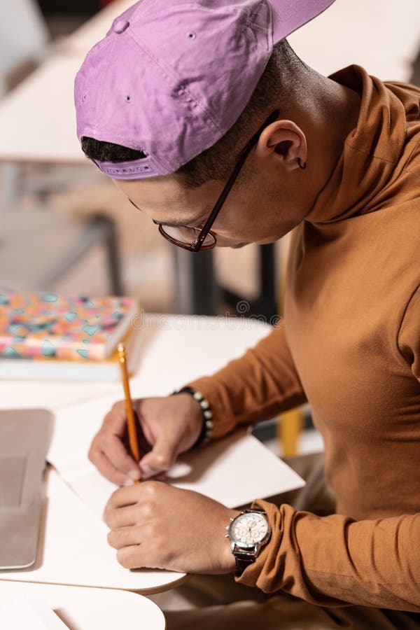 Student Preparing for Classes at University while Sitting in the ...