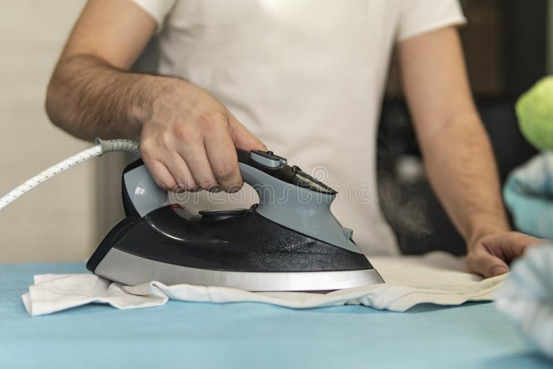 Home Working, Man Ironing His Shirts at Home Stock Image - Image of ...