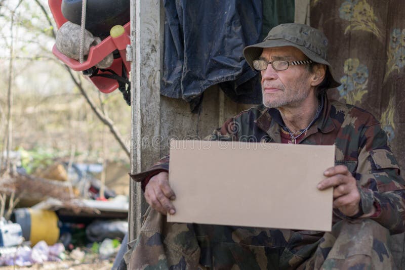 Homeless with cardboard stock photo. Image of jobless - 69401566
