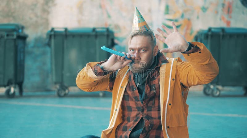 A Homeless Man in a Birthday Hat is Cheering Stock Footage - Video of ...
