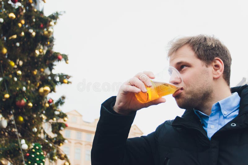 Homeless Man Drinking Beer Outside in the Street. Stock Photo - Image ...