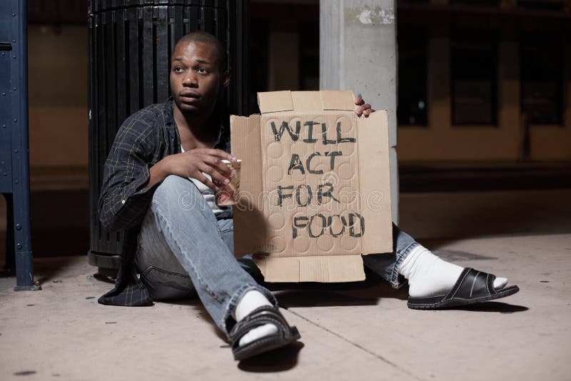 Homeless Man Holding a Sign Stock Photo - Image of outdoors, homeless ...