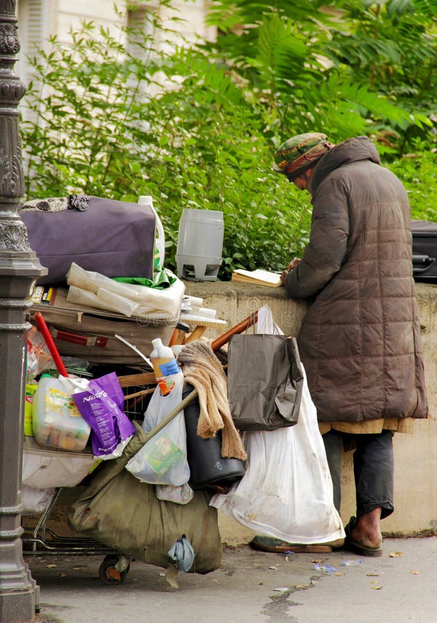Homeless man in Paris editorial photography. Image of unemployment ...