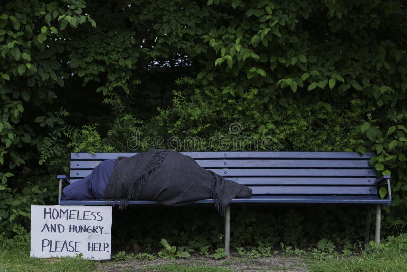 Homeless man on park bench stock image. Image of dirty - 56907327