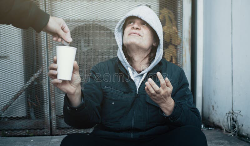 Lonely Man in Hood with His Head Down Sits on Stairs in Dark. Stress ...