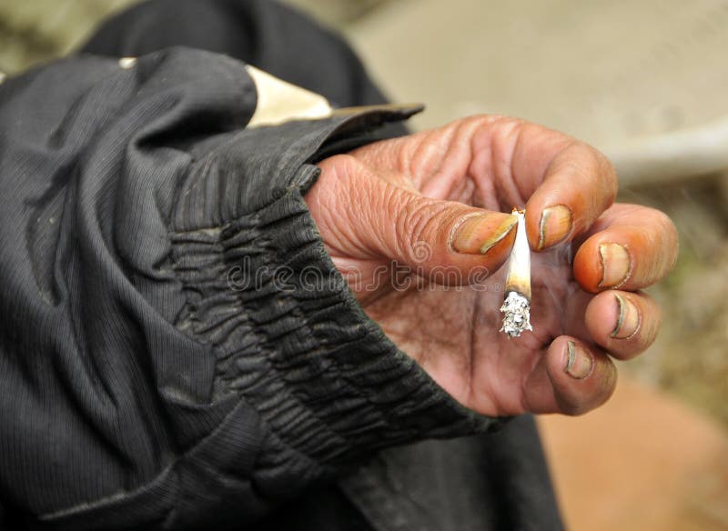 Homeless Man Smoking stock image. Image of alcoholic - 13737387