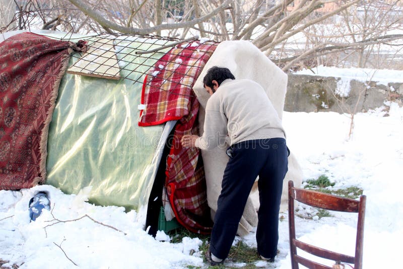 Homeless People Living Under the Snow Editorial Photography - Image of ...
