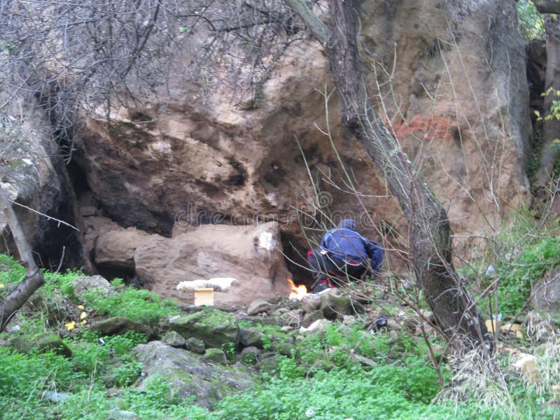 Homeless person in cave stock photo. Image of rural, dwelling - 83579870