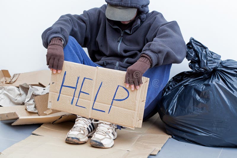 Homeless Person Sitting On The Ground Stock Photos - Image: 35827923