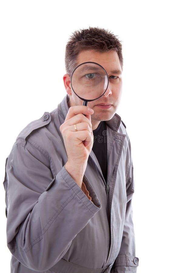 Homem com lupa imagem de stock. Imagem de olho, povos - 23802803