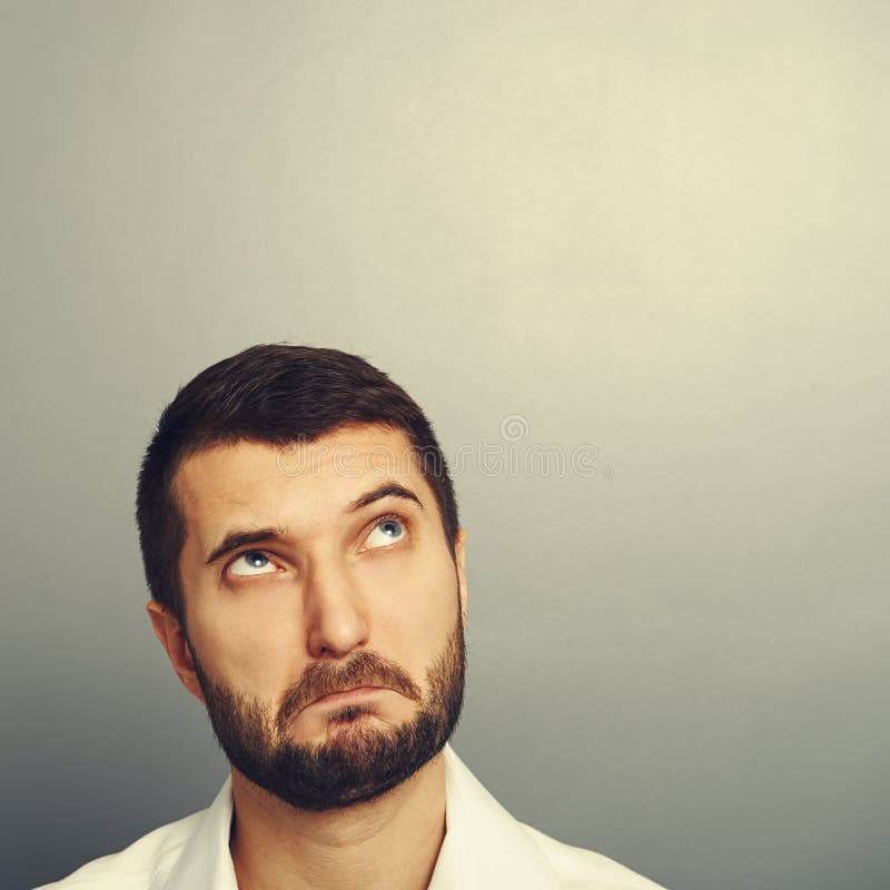 Homem Perplexo Que Olha O Copyspace Imagem de Stock - Imagem de confuso ...