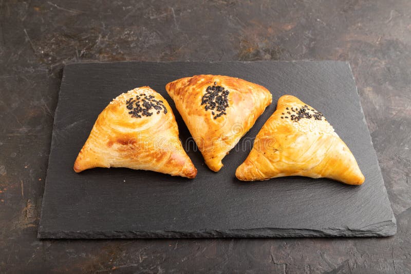 Homemade Asian Pastry Samosa on Black. Side View Stock Image - Image of ...