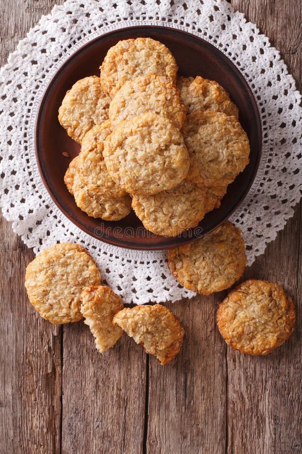 Homemade Australian ANZAC Biscuits Close Up on a Plate. Vertical Stock ...