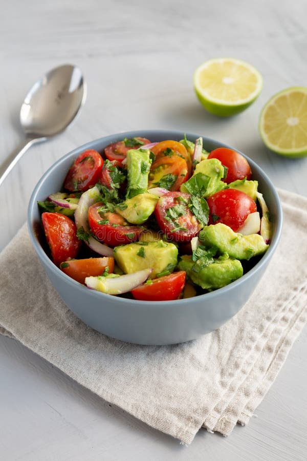 Homemade Avocado and Tomato Salad in a Bowl, Side View Stock Image ...