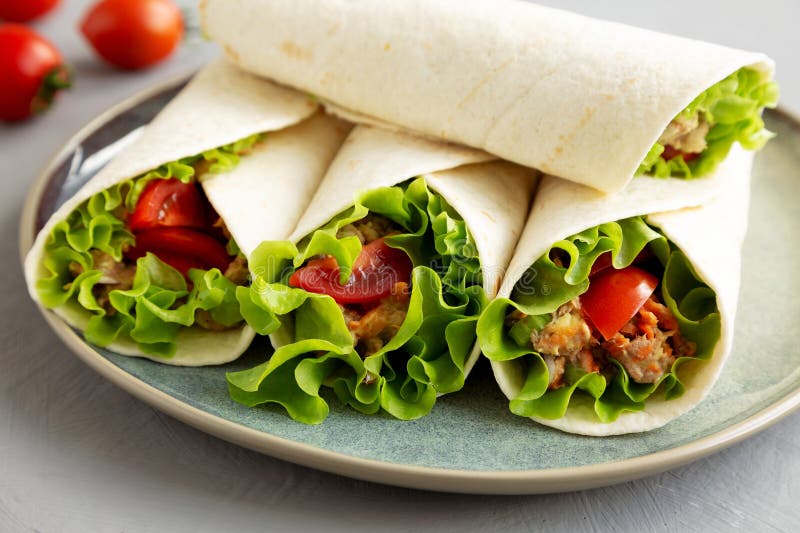 Homemade Avocado Tuna Wraps on a Plate , Side View. Close-up Stock ...