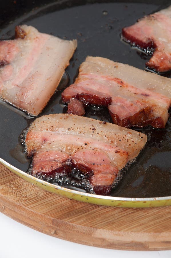 Homemade Bacon in Oil on a Frying Pan Stock Photo - Image of close ...