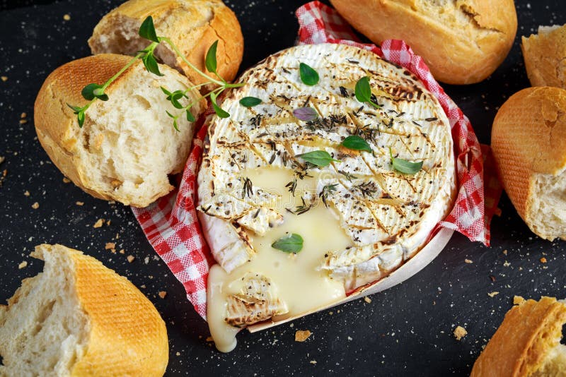 Homemade Baked Camembert Cheese with Thyme and Fresh Bread Stock Photo ...