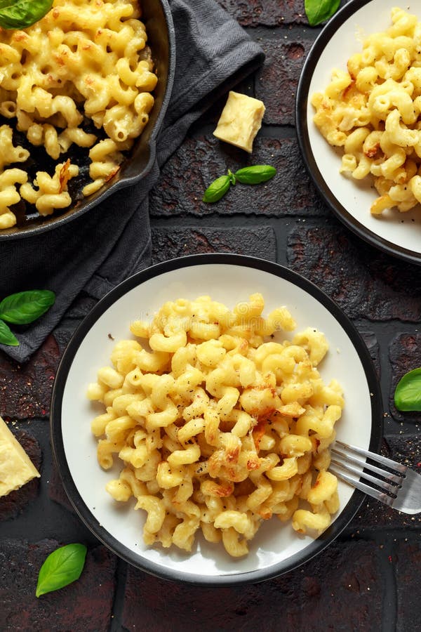 Homemade Baked Macaroni and Cheese with Cheddar Served on Plate Stock ...